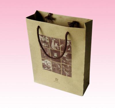 China custom large brown paper bags for toy printing with flat paper handle factory for sale