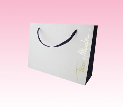 China custom ODM paper shopping bag suppliers with eyelet black cotton rope for sale