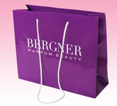 China custom purple paper bags printing manufacturer for down jacket for sale