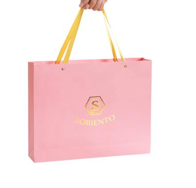 fábrica de papel de lujo de encargo de los bolsos del partido con la cuerda de la cinta de satén