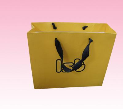bolsas de papel amarillas de encargo que empaquetan con los proveedores negros de la cuerda del algodón