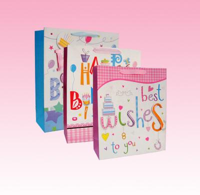 China custom recycled boutique paper gift bags with satin ribbon handle for sale