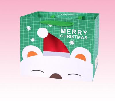 fábrica al por mayor de papel coloreada impresa de encargo de los bolsos del favor de la Navidad