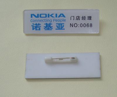 China Etiquetas de nombre de plástico personalizadas, insignias de nombre en línea para trabajar con pasador de seguridad en venta
