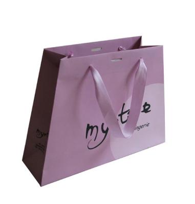 China bolsas de papel publicitarias de gran tamaño personalizadas con asa de cinta para paquete en venta
