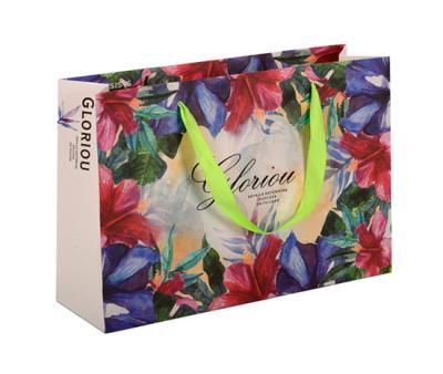 China bolsas de papel publicitarias de gran tamaño personalizadas con asa de cinta para paquete en venta