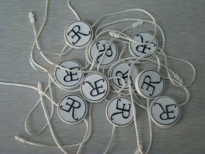China custom wholesale garment plastic hang tag manufacturer with emboss black logo for sale