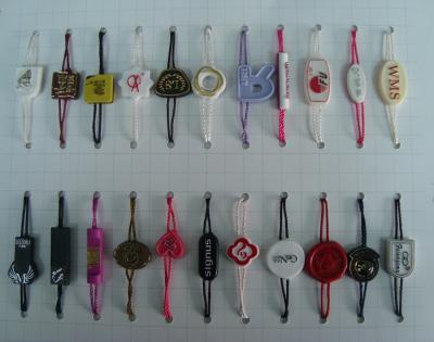 China custom clothing sensor tags garment plastic hang tag with ribbon string supplier for sale