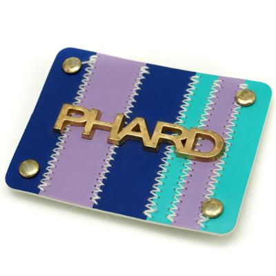 China custom real leather jacket patches leather gift tags leather tags for knitting for sale