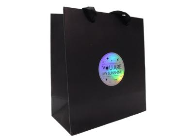 Proveedor de bolsas de compras de ropa de papel negro impresas personalizadas con logotipo de holograma