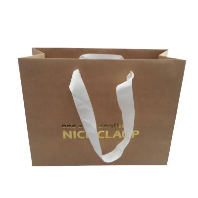China Custom Printed Recycled Brown Kraft Merchandise Bags with Twisted Handles Factory for sale