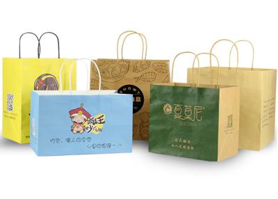 China Custom Printed Recycled Brown Kraft Merchandise Bags with Twisted Handles Factory for sale