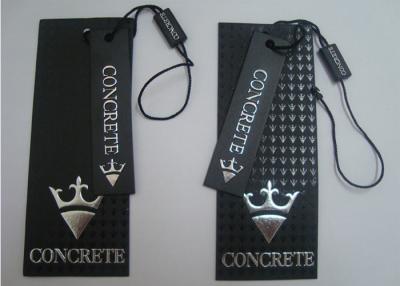 China Custom Recycled Paper Clothing Jeans Hang Tags with Spot UV Emboss Silver Foil for sale