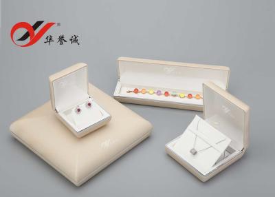 China Beige PU Leather Jewelry Box Fashinable Handmade Ring Box For Earring / Pendant for sale
