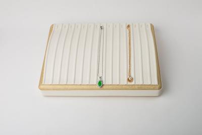 China 15 Lines Jewelry Display Trays In Off-White PU Leather Yellow Edge For Necklace Show for sale