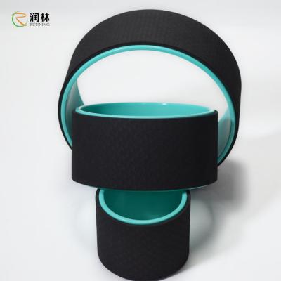 Cina La ruota 32*13cm del rullo della parte posteriore di yoga del TPE dei pp migliora la flessibilità e la stabilità in vendita