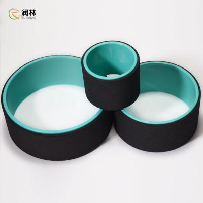 Cina La ruota 32*13cm del rullo della parte posteriore di yoga del TPE dei pp migliora la flessibilità e la stabilità in vendita