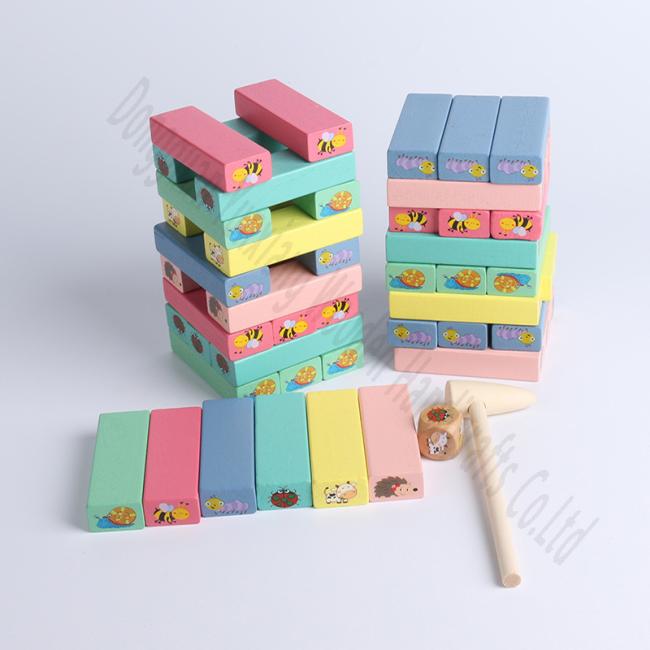 Colorful wooden building blocks set with animal prints and wooden hammer