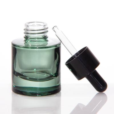China Cosmetic Skincare Packaging 20ml 30ml Cylinder Clear Amber Hair Essential Oil Serum Glass Dropper Bottle for sale
