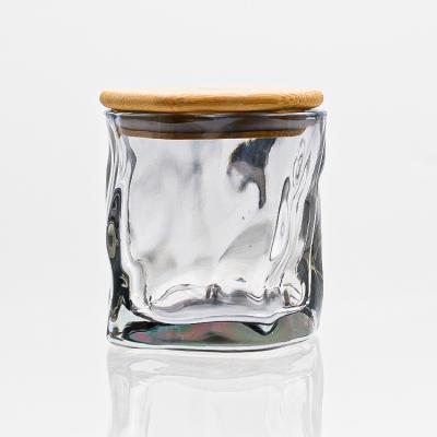 Cina Lussureggiante a sfera 250ml 8oz Conti di candele di vetro trasparente a ghiaccio rotondo con coperchio in vendita