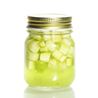 China Free Sample 32oz Glass Canning Jars Glass Mason Jar with Metal Lid for sale