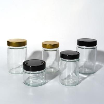 China Fabrica de alimentos Utilização 1 oz 4 oz 8 oz Forma redonda recipiente de armazenamento vazio transparente vidro gelatina doce de mel molho Jar à venda