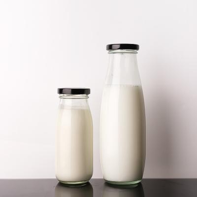 Cina Campione gratuito 100Ml 200Ml 350Ml Pasterizzazione Tè da bere a freddo Latte bottiglie di vetro con coperchio metallico in vendita