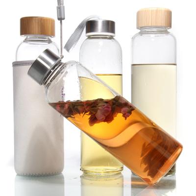 Cina Bottiglie di vetro Eco-friendly Bpa Free Capo in acciaio inossidabile 500ml Bottiglia d'acqua di vetro da bere in vendita