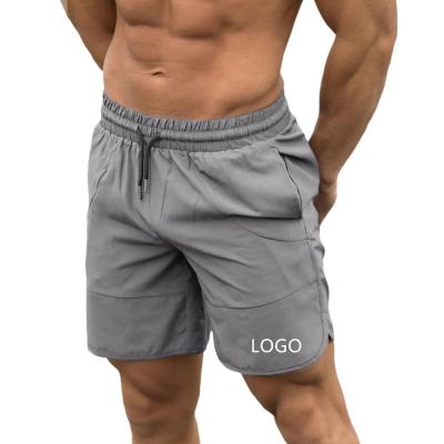Cina L'allenamento a 7 pollici dell'elastam degli uomini mette con le tasche Mesh Fitness Mens Gym Shorts in vendita