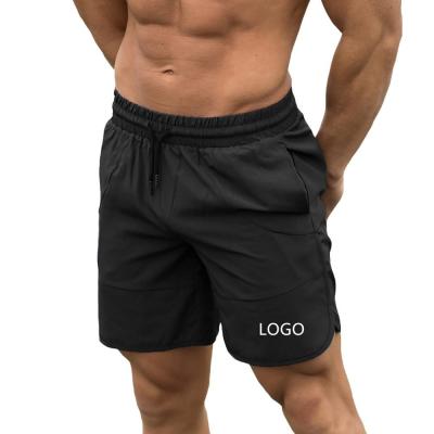 Cina L'allenamento a 7 pollici dell'elastam degli uomini mette con le tasche Mesh Fitness Mens Gym Shorts in vendita