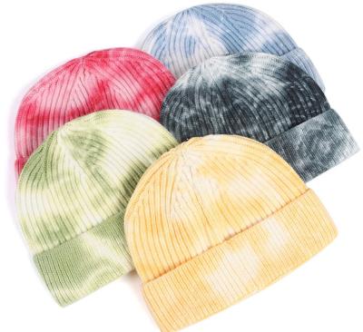 Cina I Beanies ed i cappucci acrilici della tintura 100 del legame delle donne Cuffed l'inverno caldo tricottano il cappuccio del cranio del cappello dell'orologio in vendita