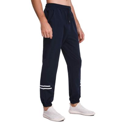 Cina Pantaloni Streetwear hip-hop casuale del carico degli uomini del pannello del cammuffamento di forma fisica della palestra in vendita