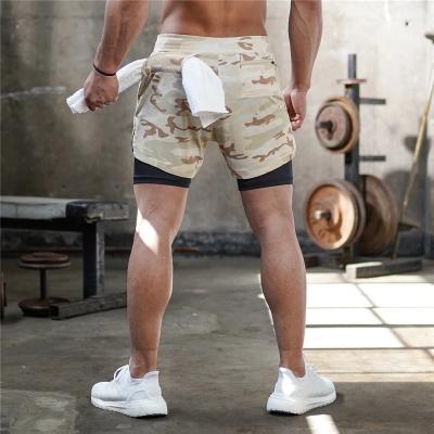 China Elastische de Trainingborrels Mannelijk Mesh Athletic Shorts With Pockets van de Taillecompressie Te koop