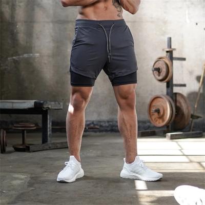 China Elastische de Trainingborrels Mannelijk Mesh Athletic Shorts With Pockets van de Taillecompressie Te koop