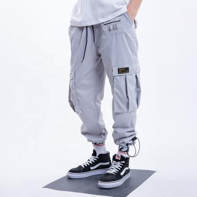 Cina Pantaloni correre di nylon dei pareggiatori impermeabili degli abiti sportivi della giacca a vento in vendita