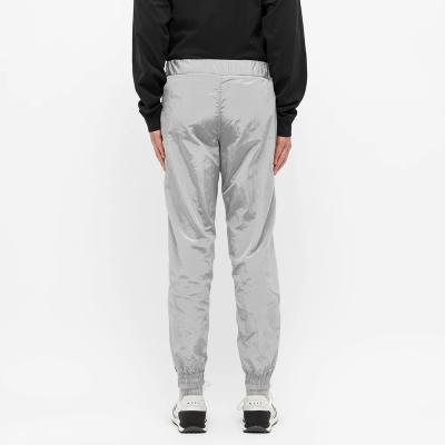 Cina Pantaloni di nylon affusolati della giacca a vento degli uomini dei pareggiatori degli abiti sportivi dello zip adatto della caviglia con le chiusure lampo in vendita