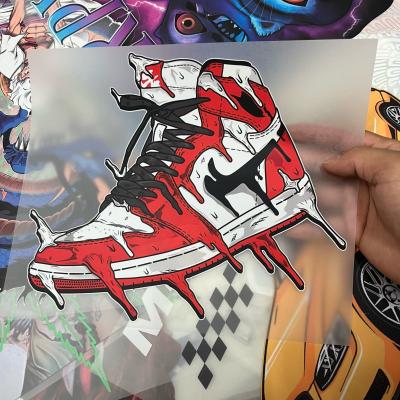 China High-Quality Ready to Press DTF Heat Transfer Stickers – Customizable Size on Durable PET Film for T-Shirt Branding & Custom Design for sale