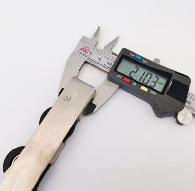 China Stainless Steel 201 Sliding Window Roller with 21*15 Size and 15mm Width for Smooth Sliding Door and Window Operation for sale