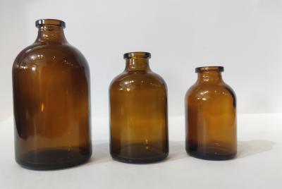 Cina 10ml- 100ml Ups tipo Ii Iii fiala di vetro ambrato/trasparente modellato per confezioni di iniezione di polvere farmaceutica e veterinaria in vendita