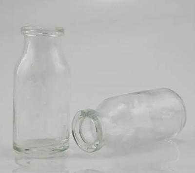 China Clear and Amber molded glass bottle for sale