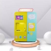 China 12 Fancy Smart Candy Floss Machine Fully Unattended Automatic Candy Floss Machine for sale