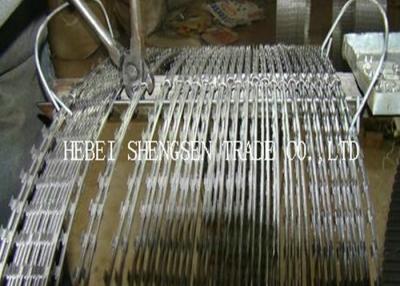 China Hot Dipped Galvanized Concertina Razor Barbed Wire Cross Razor 0.45mm - 0.65mm for sale