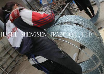 China 0.5mm CBT - 65 Galvanized Razor Blade Barbed Wire With 22 mm Razor Length for sale