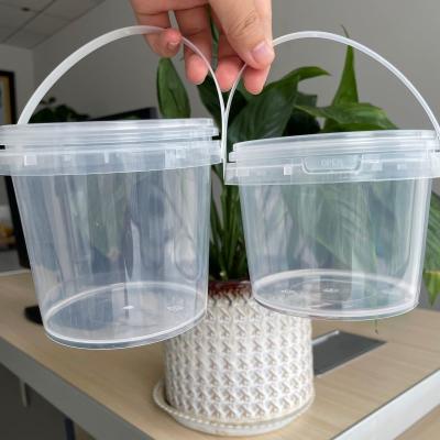 中国 クリアドーナツバケツ 蓋とハンドル BPAフリー 再利用可能なプラスチックバケツ 32オンス飲みバケツ 販売のため