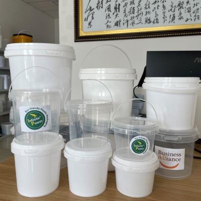 Cina Bottine di plastica rotonde su misura con coperchio per imballaggio contenitore di popcorn di cotone di arachidi in vendita