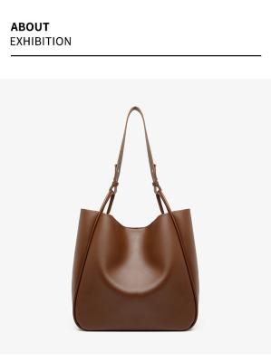 China Cheap women's large capacity one shoulder bucket bag commuter bag for sale