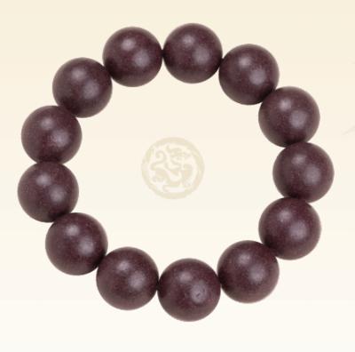 China Purple Wood Ball Bracelet Relieves Pain Warms Uterus Herbal Small Wooden Bead Bracelet for sale