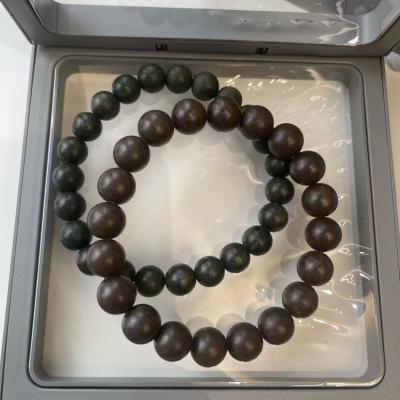 China Agarwood Wooden Buddha Beads Bracelet Dragon'S Saliva Snow Style Large Wood Bead for sale