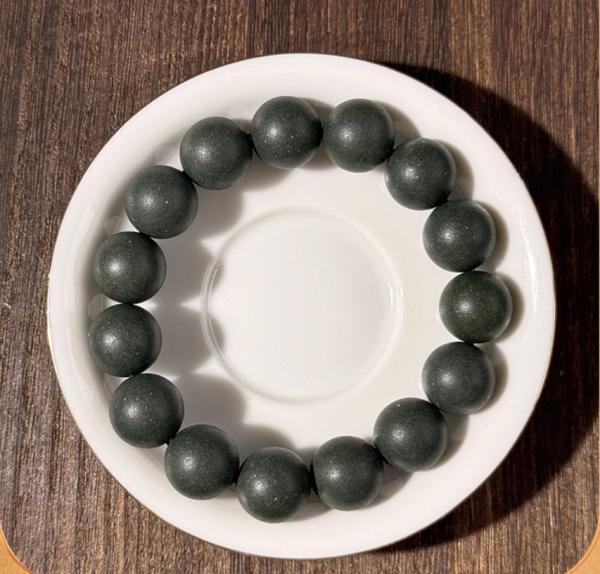 Quality Buddhist Green Wood Ball Bracelet Clove Herbal Diy Wood Bead Bracelet With Mugwort for sale
