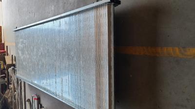 中国 50-100kg バッグ トラック スクリューコンベヤー 荷装機 小帯コンベヤー PVC帯コンベヤー 販売のため